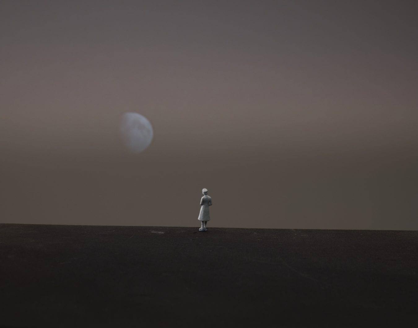 Solitary figures amid desolate landscapes in Nadav Kander's latest series